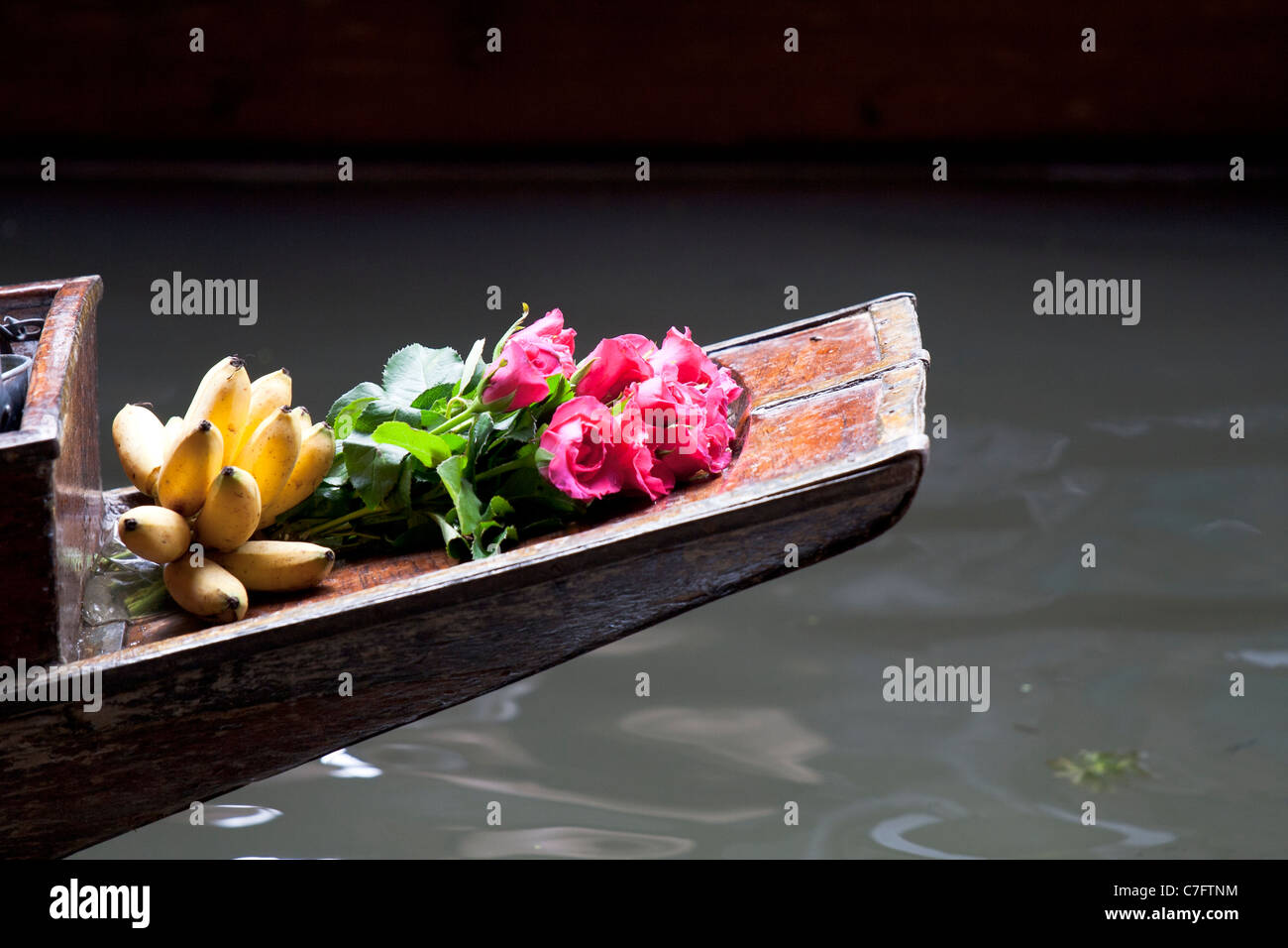 The brow of a boat with flowers and fruits at the Dameon Saduk floating ...