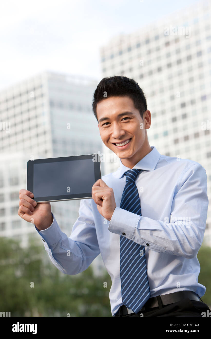 Businessman Using a Tablet Stock Photo - Alamy