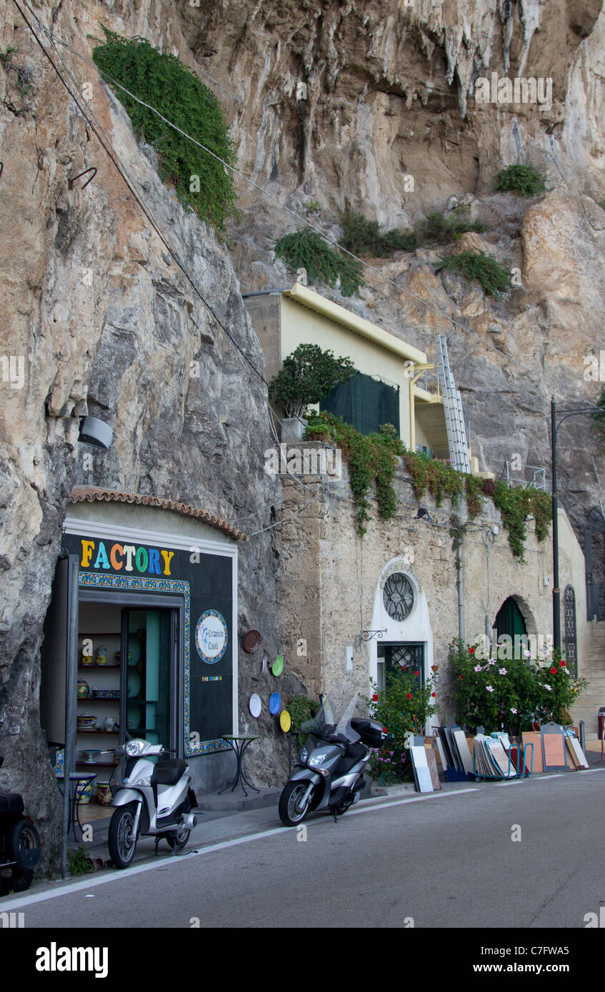 Ceramics factory outlet built into the cliff face, Positano Stock Photo ...