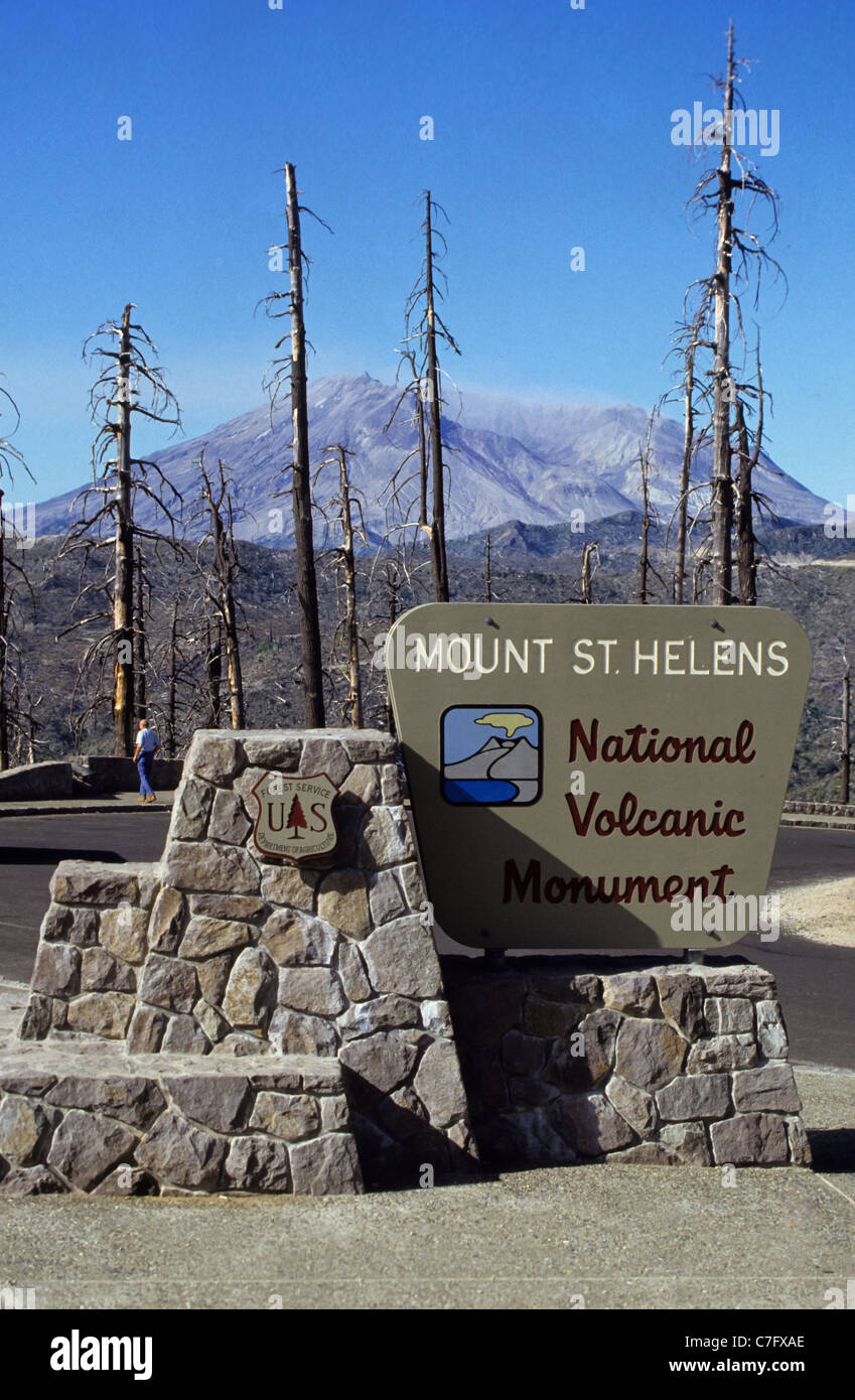 Mt. Saint Helens crater with dead trees and the national park sign ...