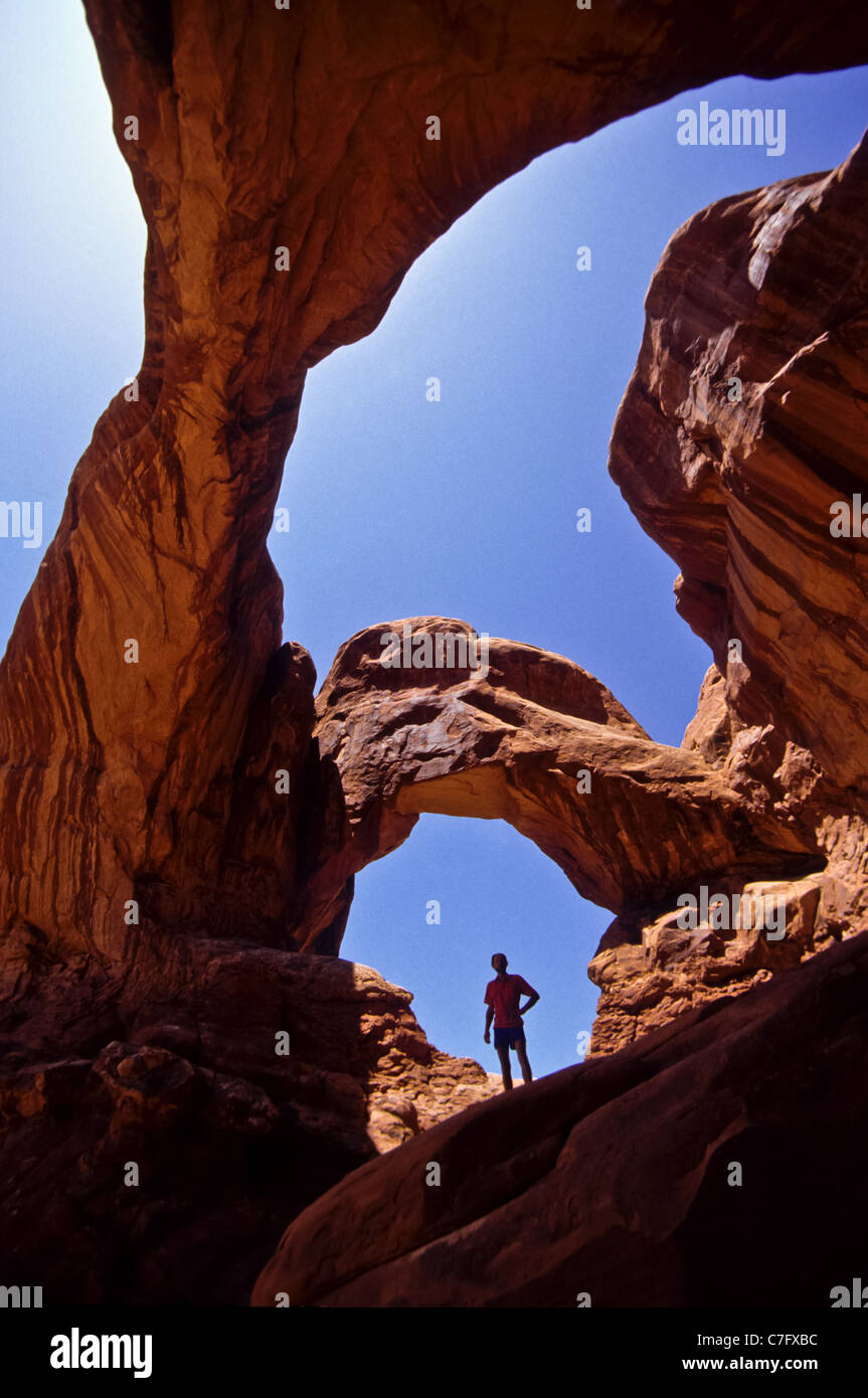 Man standing in double arch hi-res stock photography and images - Alamy