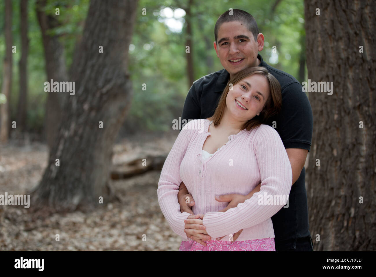 Young woman arms wrapped around hi-res stock photography and images - Alamy