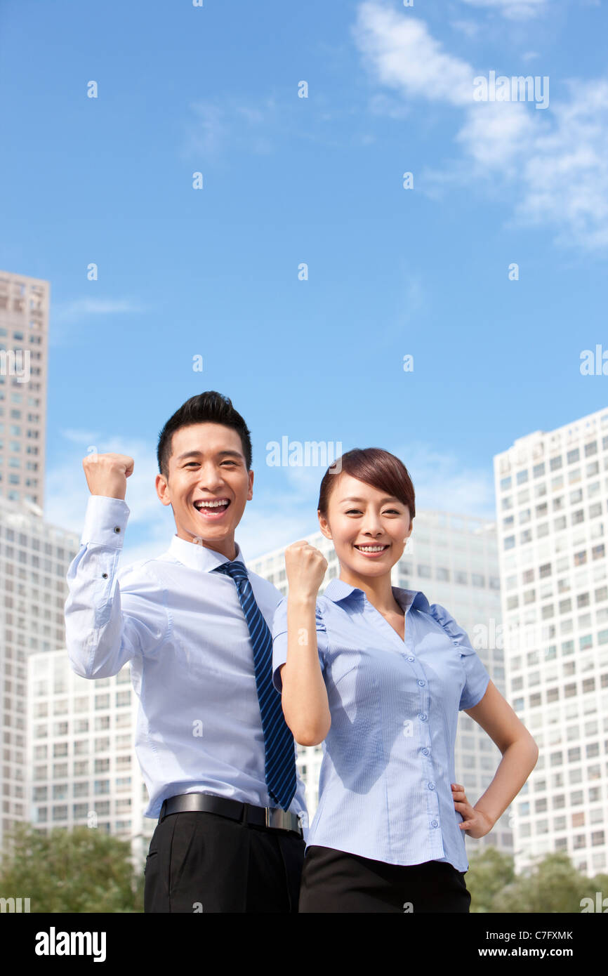 Colleagues Standing Cheering Together Stock Photo - Alamy