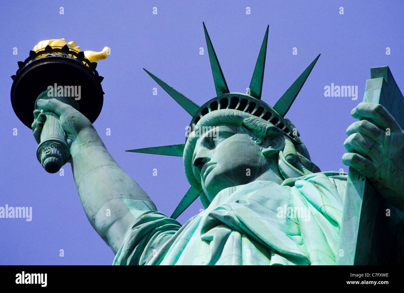 Statue of Liberty head and arm from a low angle Stock Photo - Alamy