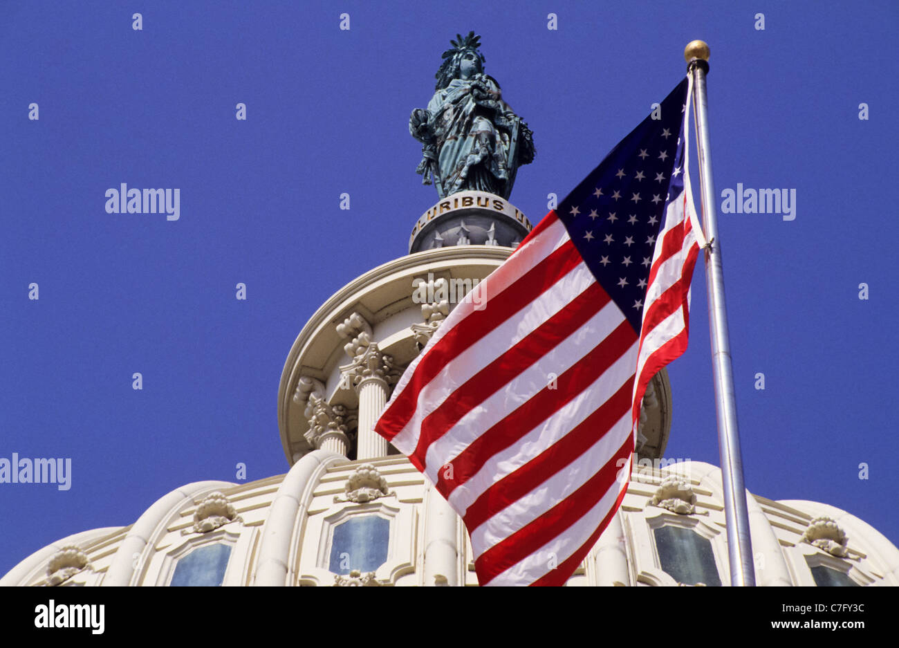 The Capitol with the american flag in Washington DC, USA. Stars and ...