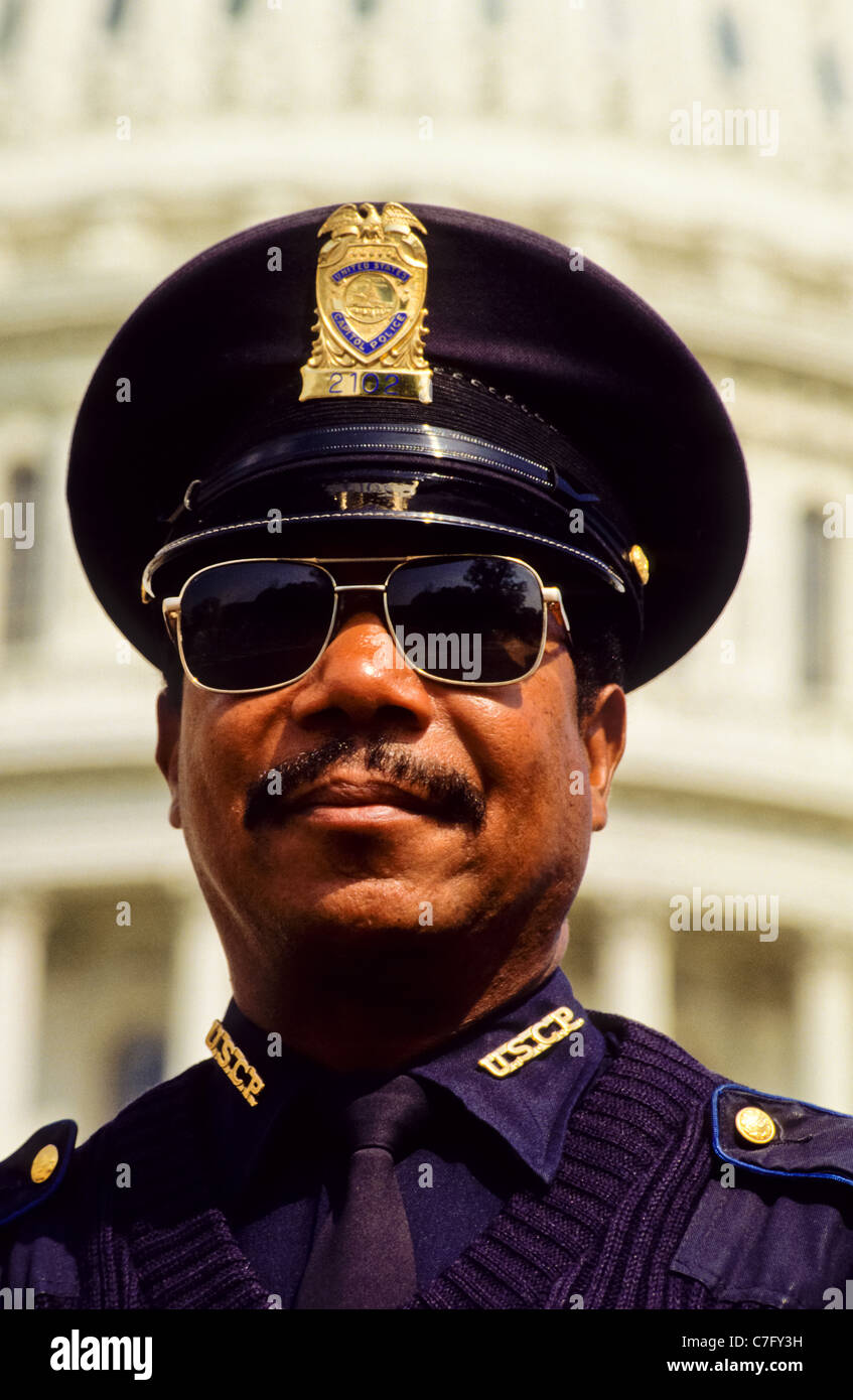 Black police man hi-res stock photography and images - Alamy