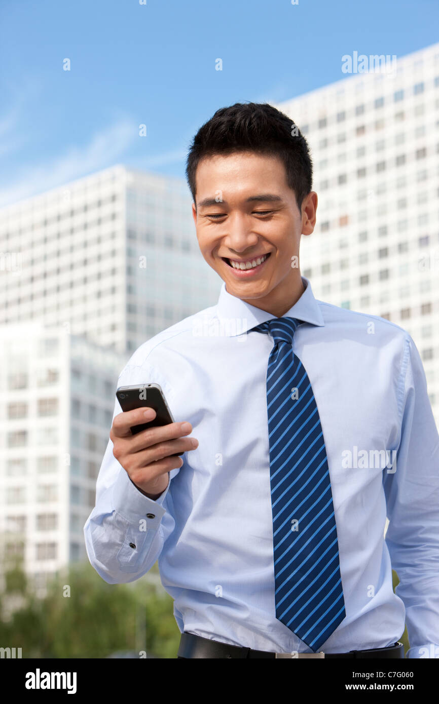 Businessman Using Mobile Phone Stock Photo - Alamy
