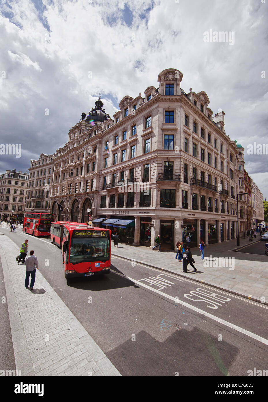Buses moving on London street, England Stock Photo - Alamy