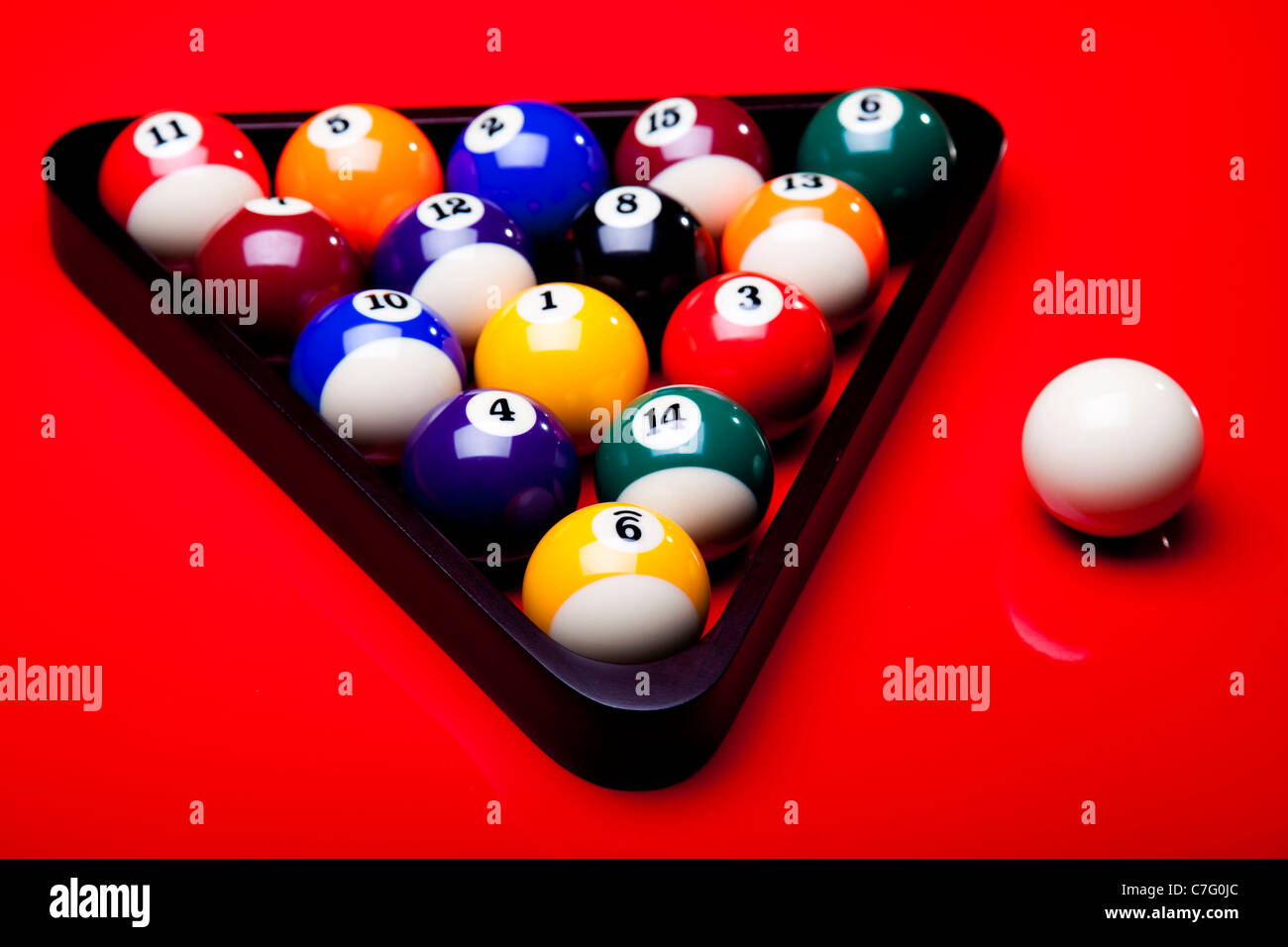 Billiard balls isolated on red Stock Photo - Alamy