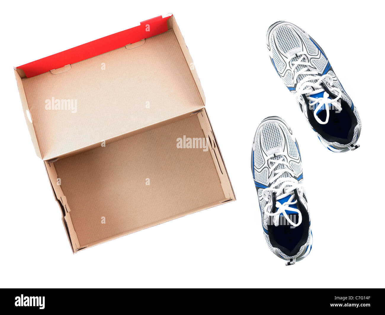 Sports runners situated next to a shoe box Stock Photo - Alamy