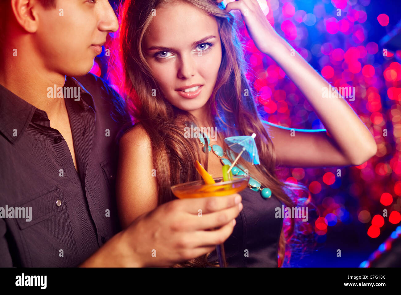 Image of pretty girl with her boyfriend in the night club Stock Photo ...