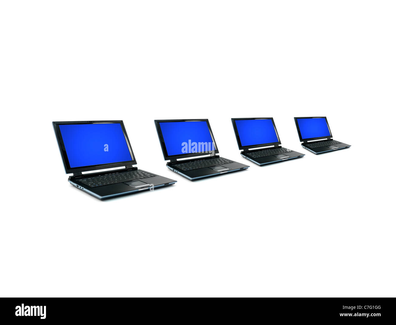 A row of laptops computer isolated against a white background Stock ...