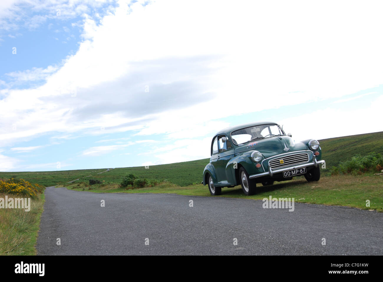 classic Morris Minor touring the Dartmoor countryside Devon UK Stock ...