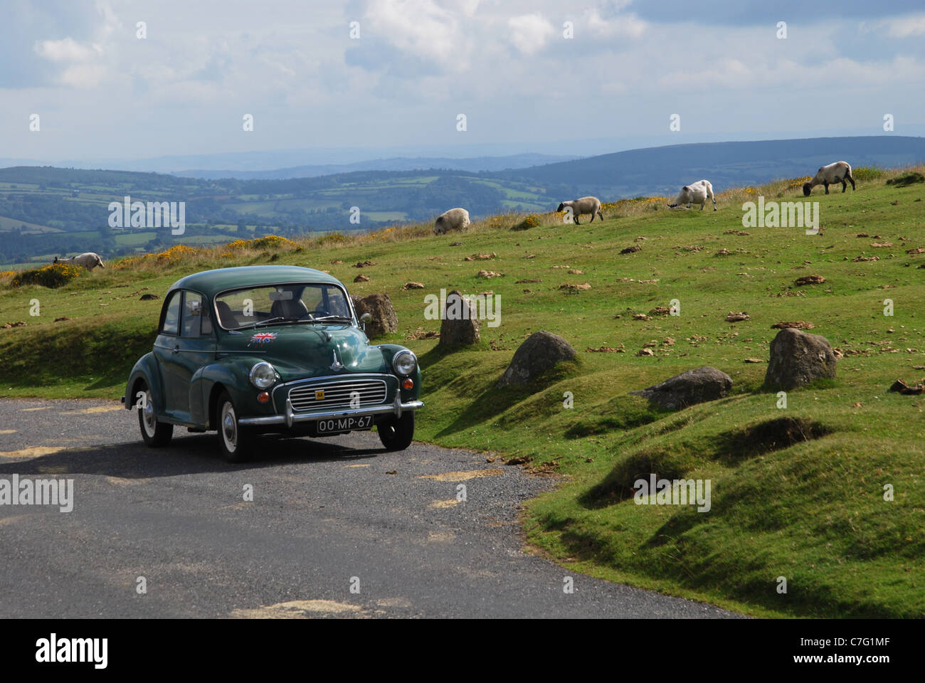 classic Morris Minor touring the Dartmoor countryside Devon UK Stock ...