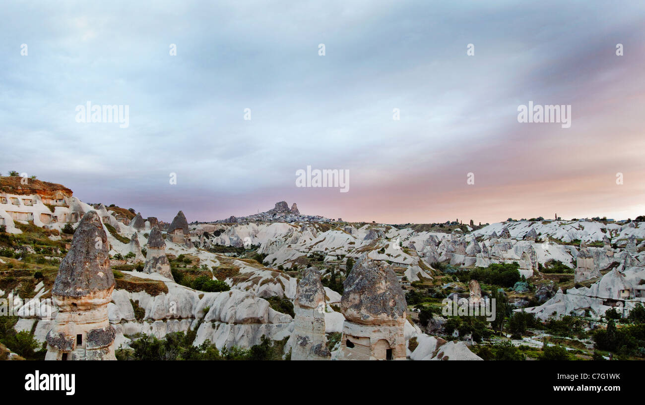 Panorama landscape dawn sunrise over Goreme Valley Fairy Chimney cave ...