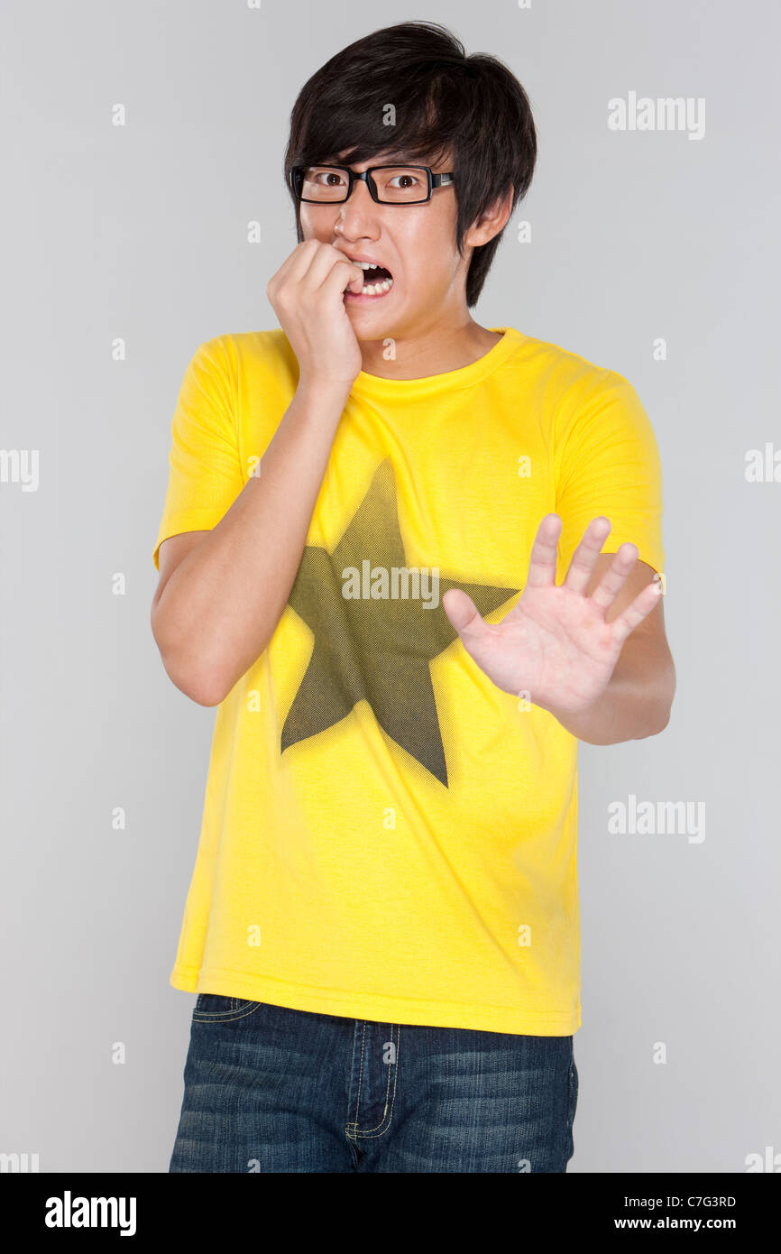 Portrait of a Scared Young Man Stock Photo - Alamy