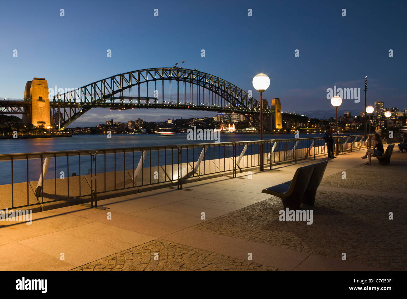 Sydney harbour bridge at dusk, from Opera House broadwalk, Sydney ...