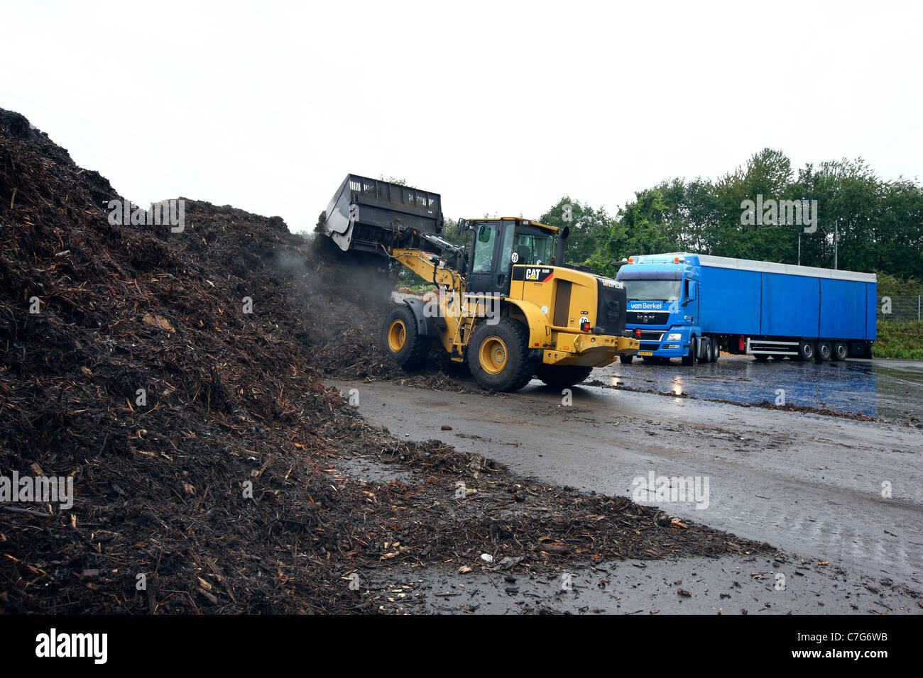 Biomass power plant. Burns waste wood to heat water, for running a ...