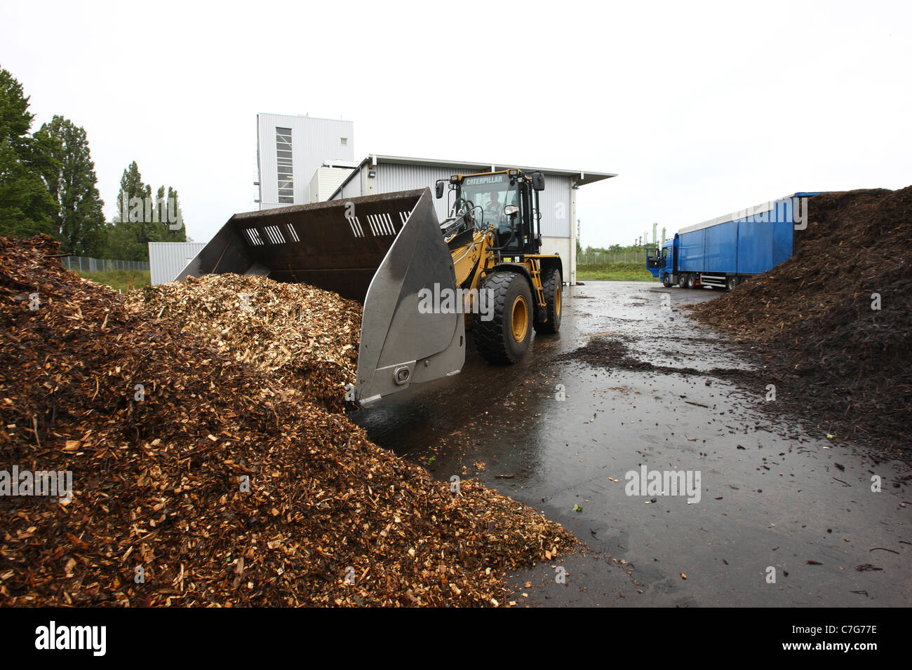 Biomass power plant. Burns waste wood to heat water, for running a ...