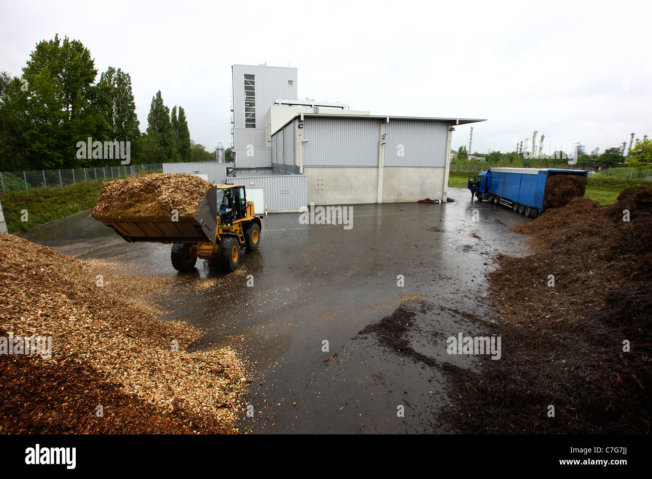 Biomass power plant. Burns waste wood to heat water, for running a ...