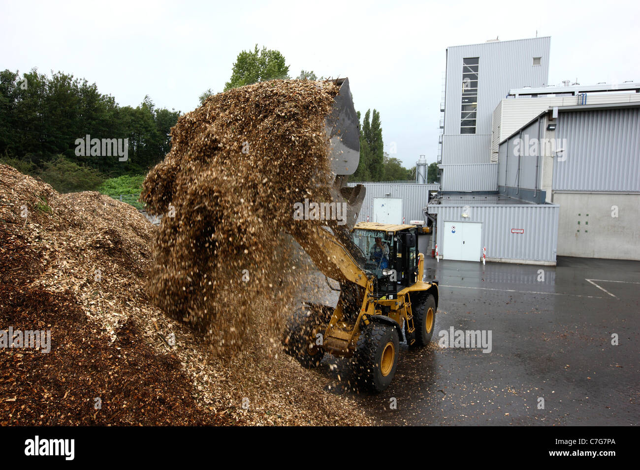 Biomass power plant. Burns waste wood to heat water, for running a ...