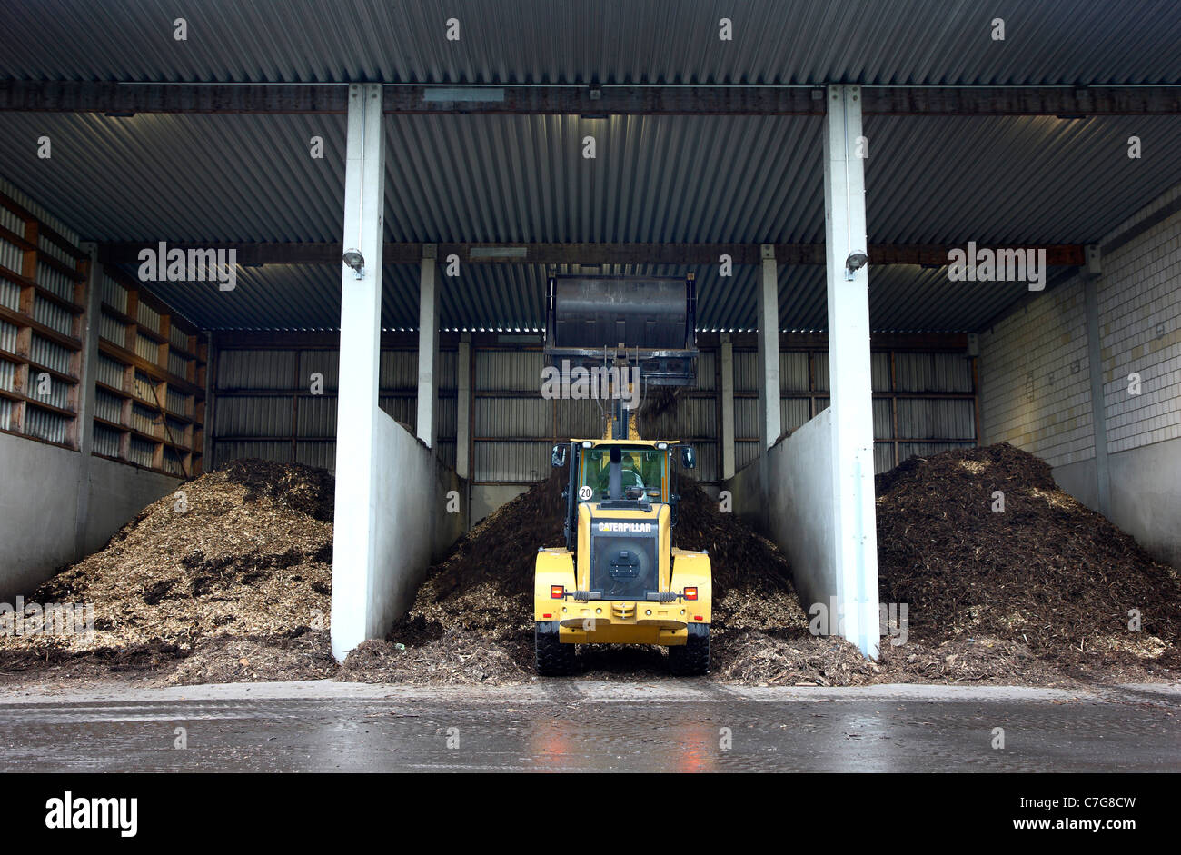 Biomass power plant. Burns waste wood to heat water, for running a ...