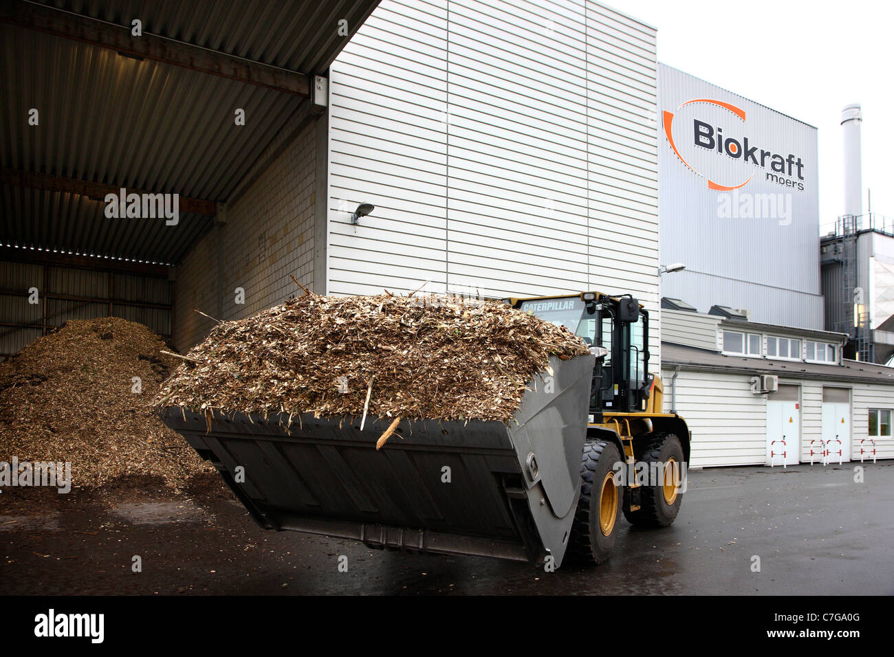 Biomass power plant. Burns waste wood to heat water, for running a ...