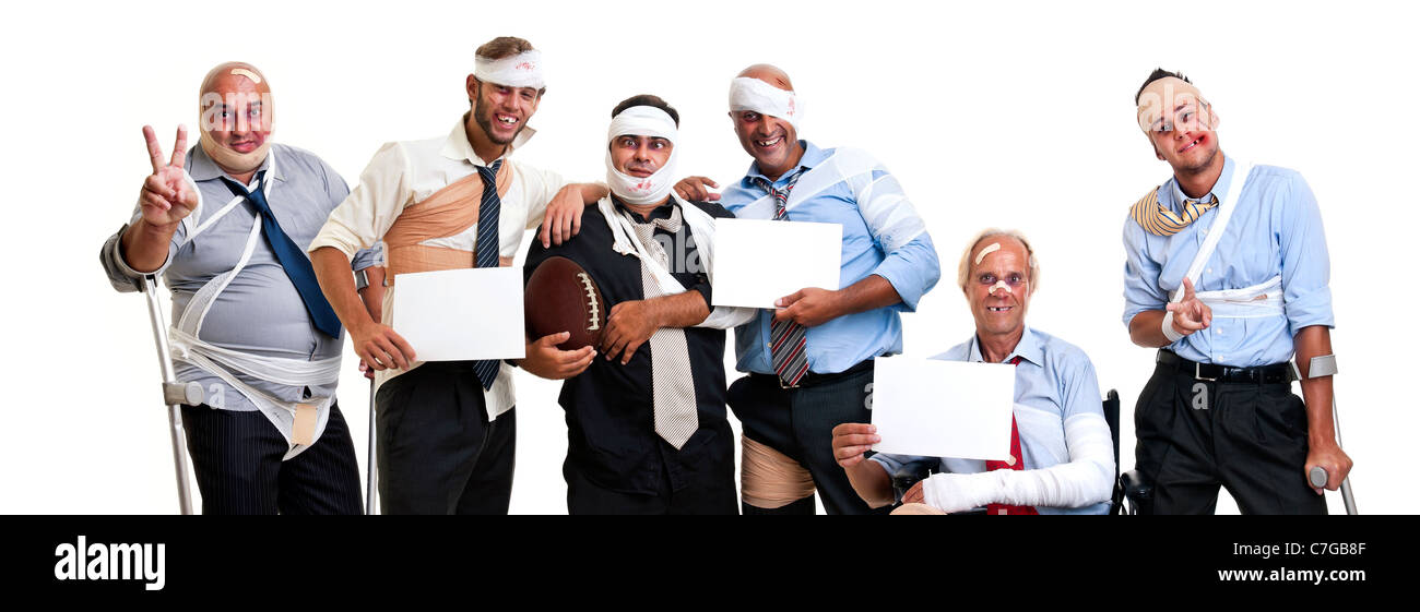 Group of injured businessmen after a rugby game Stock Photo - Alamy