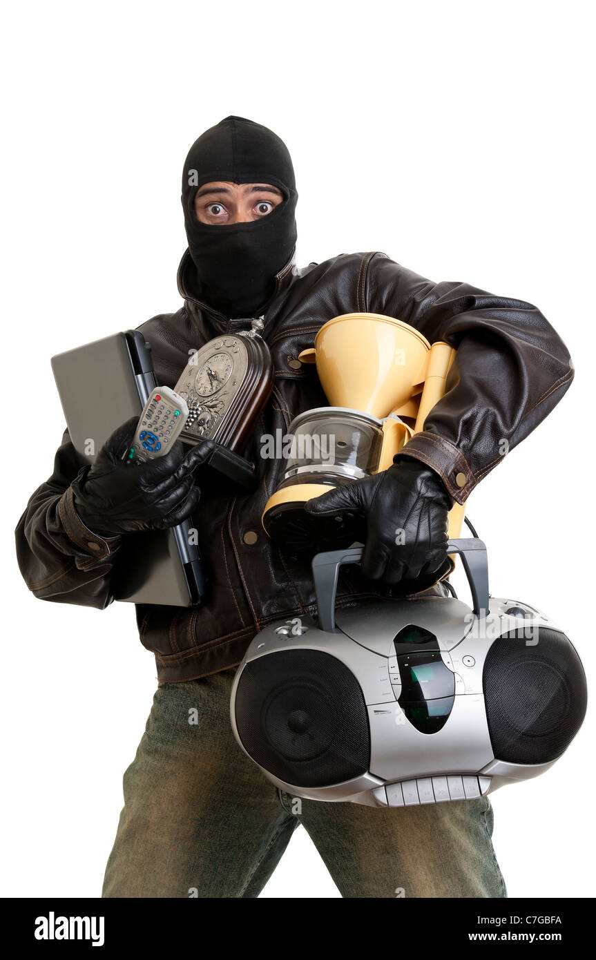 Burglar with goods isolated in white Stock Photo - Alamy