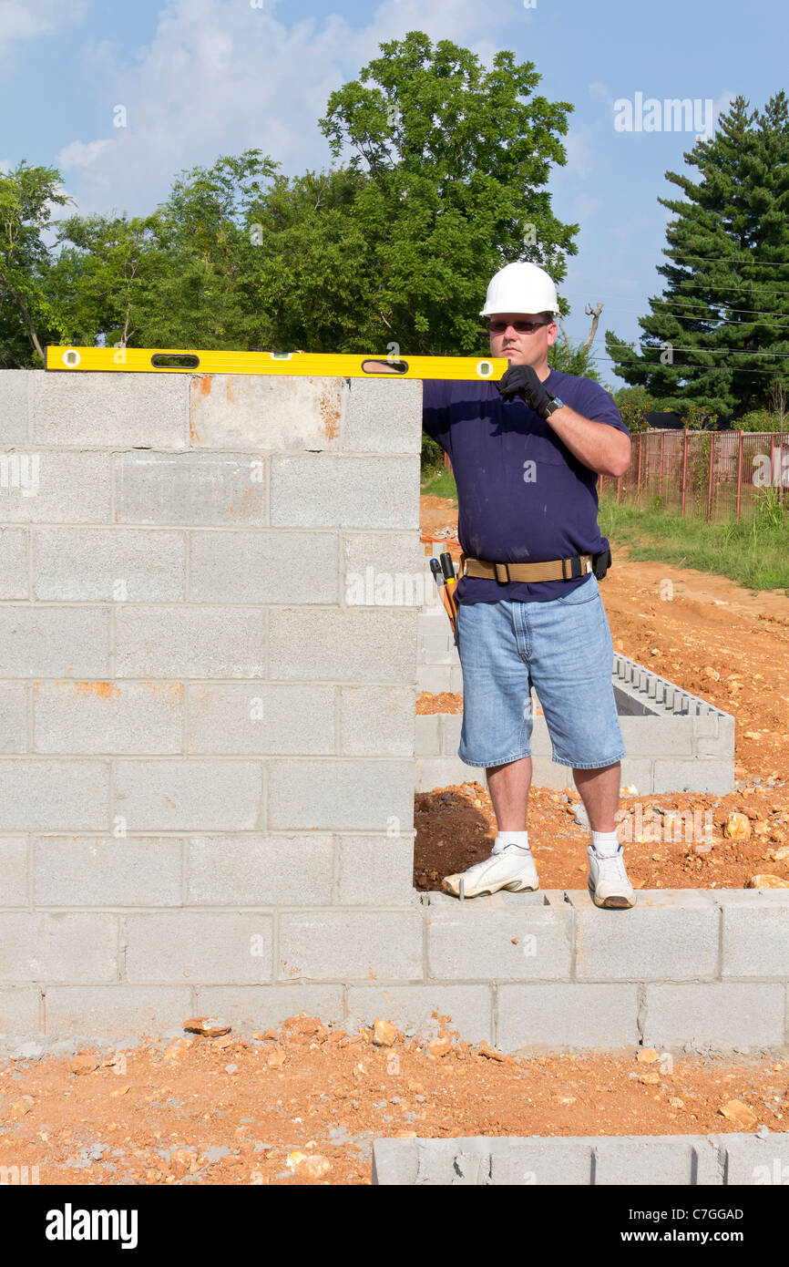 Carpenter Working On New Apartment Community Construction Stock Photo ...