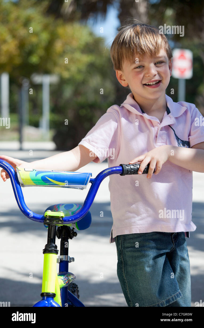 A boy with a bike Stock Photo - Alamy