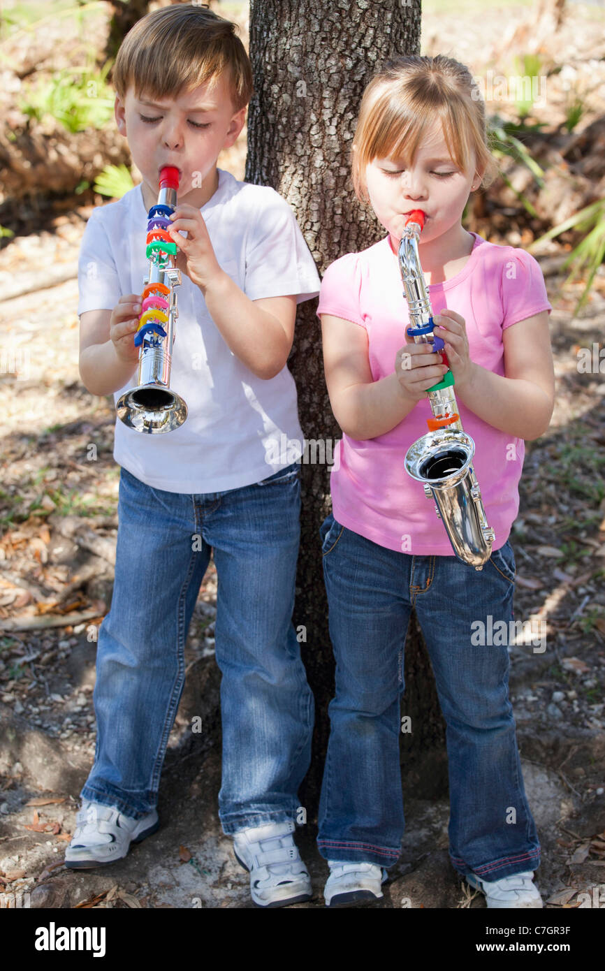 Children playing saxophone hi-res stock photography and images - Alamy