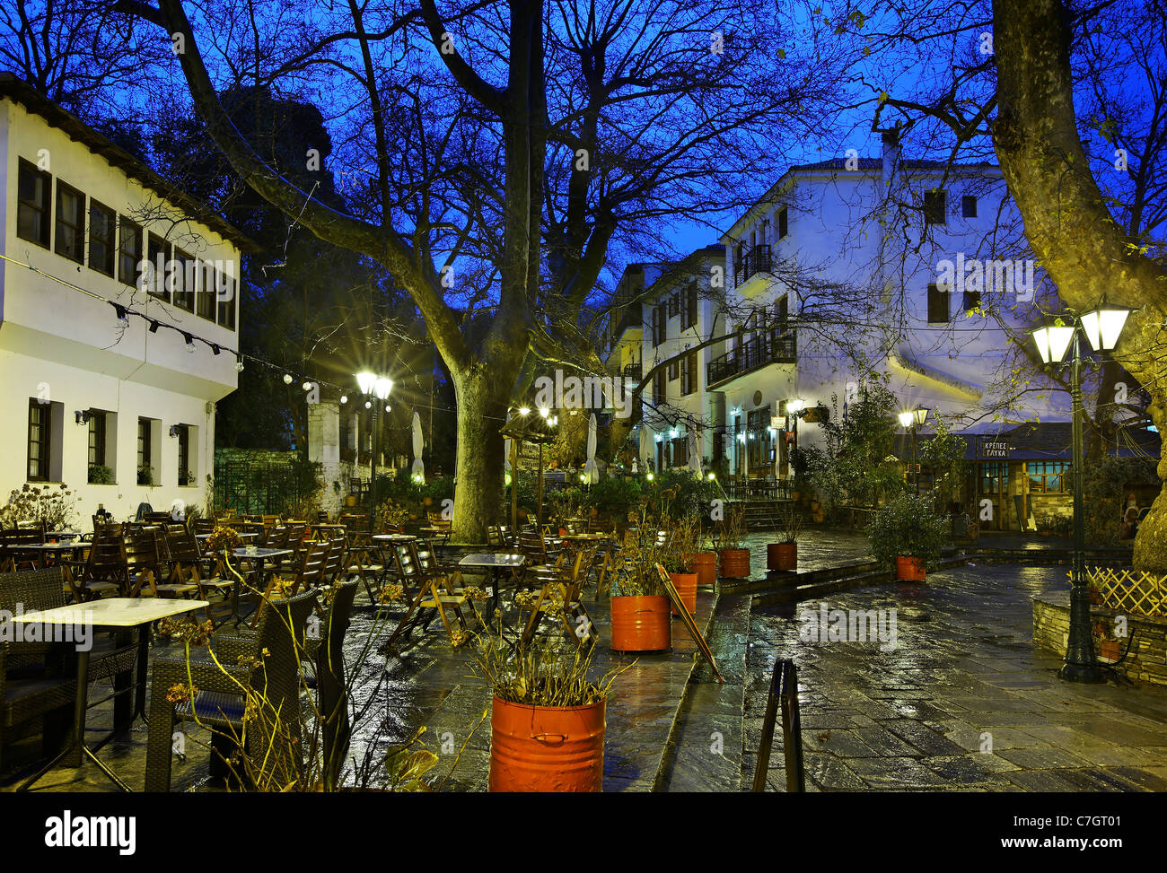 Night view from the central square of Portaria village, Pelion mountain ...