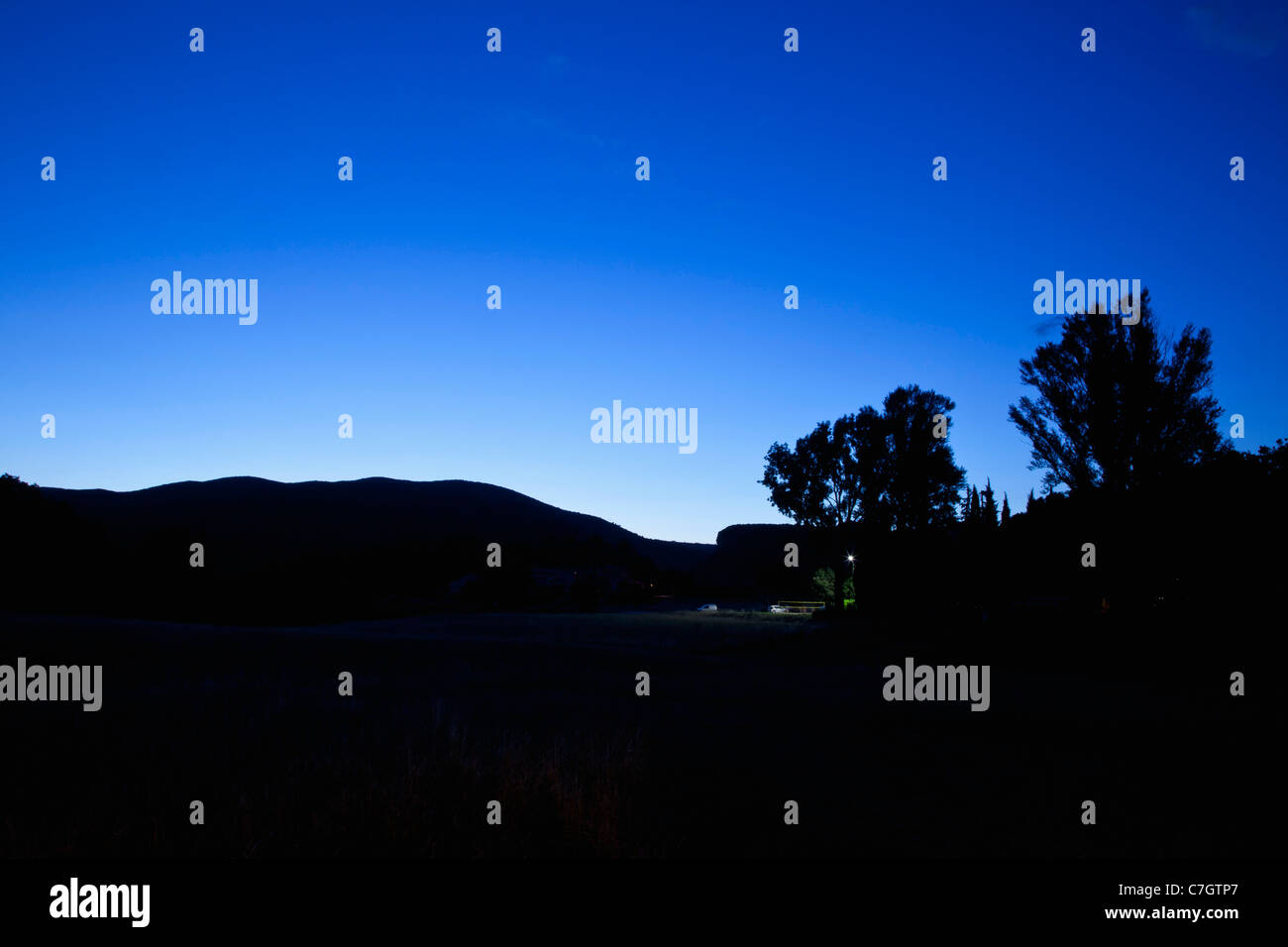 A rural scene at dusk Stock Photo - Alamy