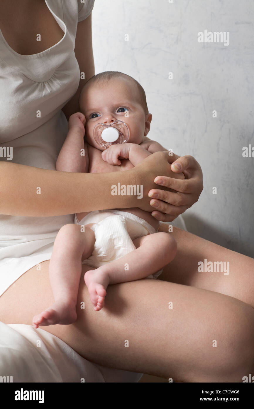 A mother holding her newborn baby Stock Photo - Alamy A mother holding her newborn baby Stock Photo - Alamy
