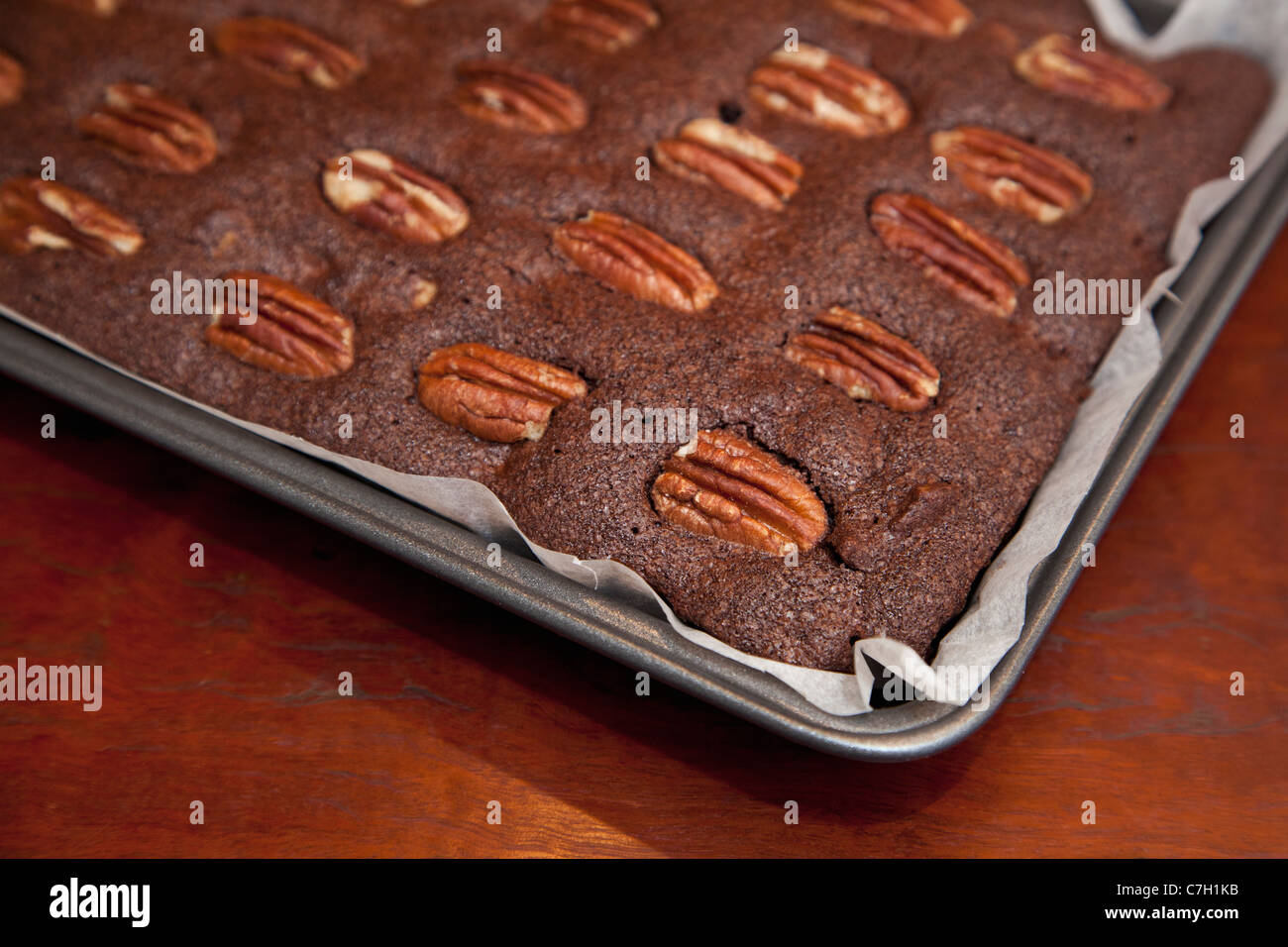 Detail of a baked cake in a tray Stock Photo - Alamy