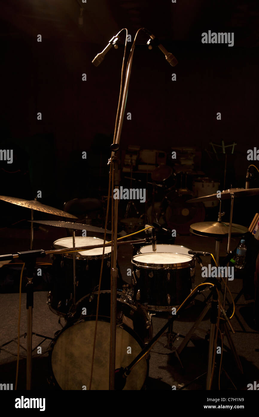 Microphones and instruments in a recording studio Stock Photo - Alamy