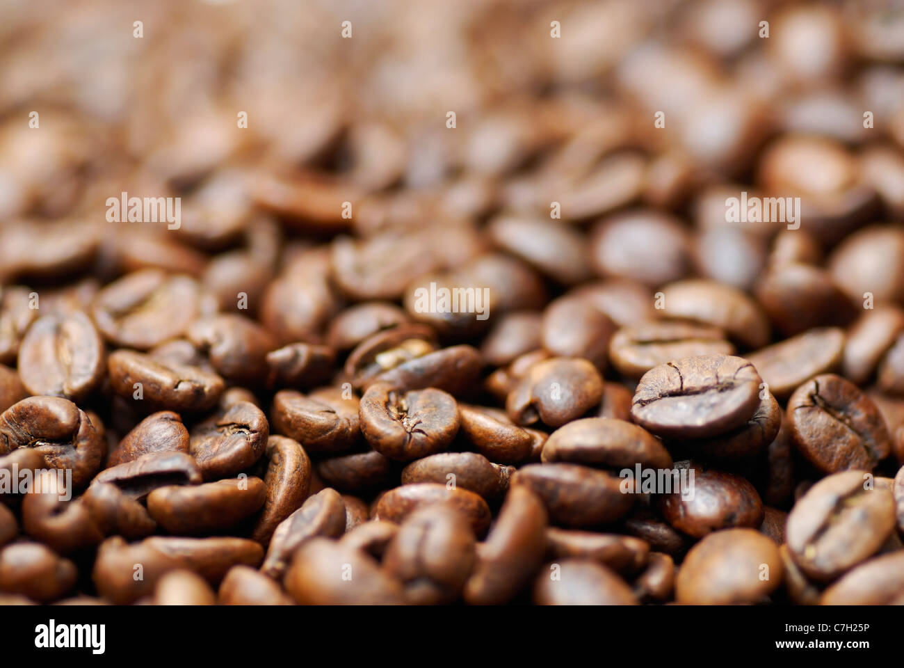 Pile of decaffinated coffee beans, short DOF focus on foreground Stock ...