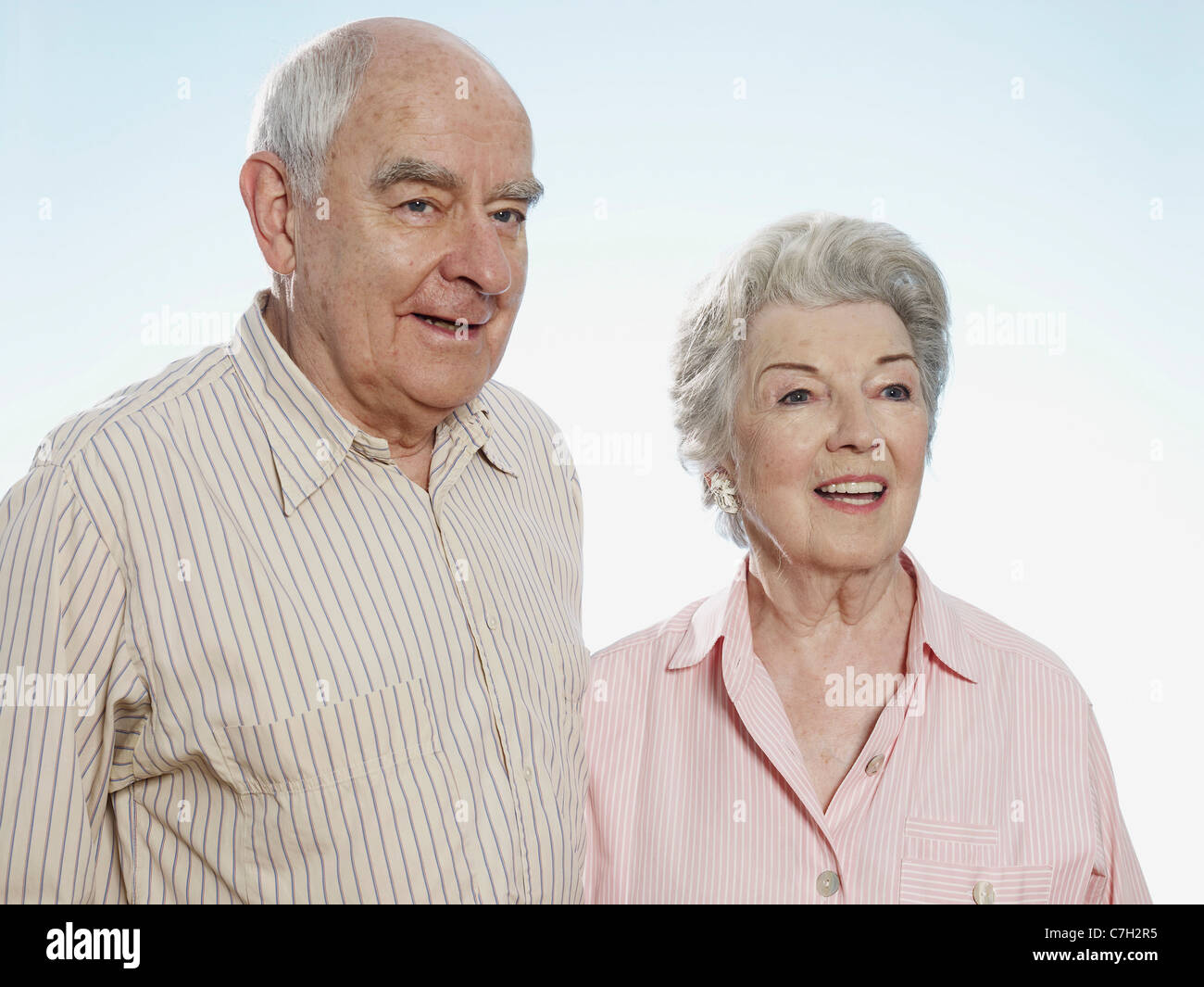 Senior couple look into distance Stock Photo - Alamy