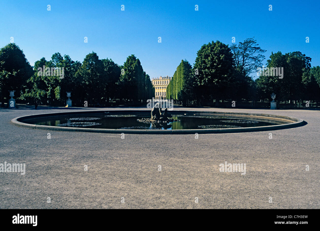Austria, Vienna, water fountain with Schonbrunn Palace seen far in the ...