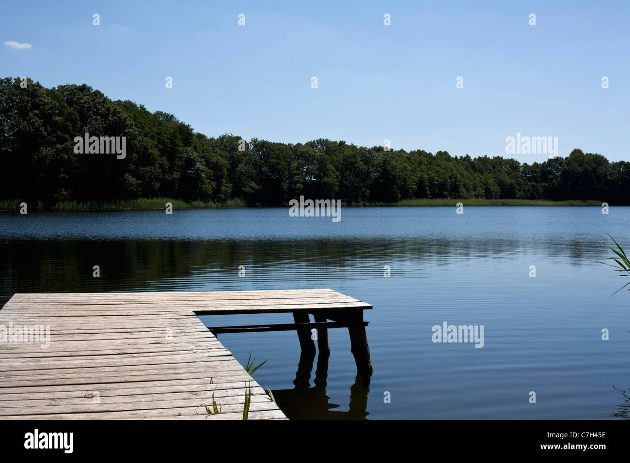 Lake and jetty Stock Photo - Alamy