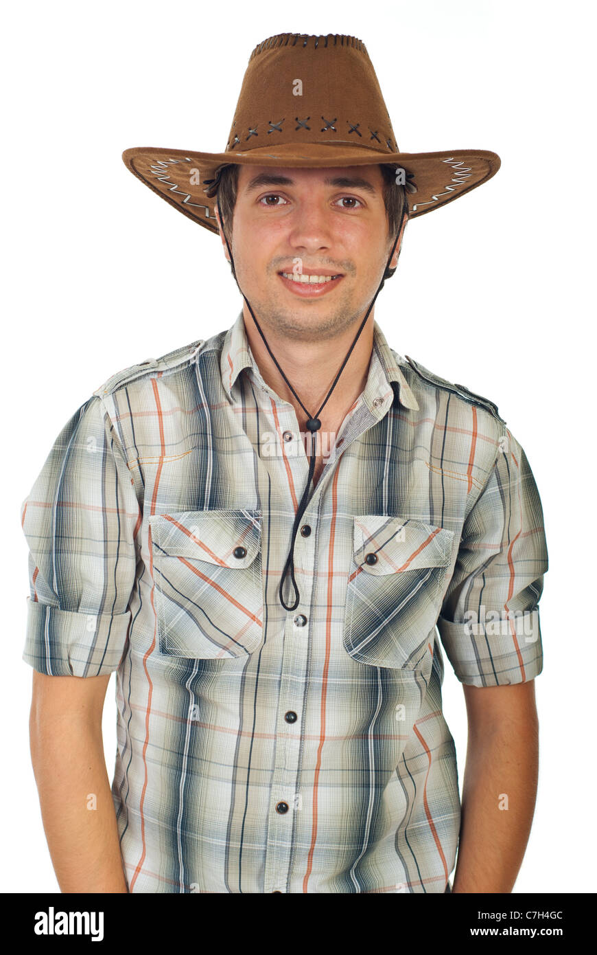 Happy young cowboy with hat isolated on white background Stock Photo ...