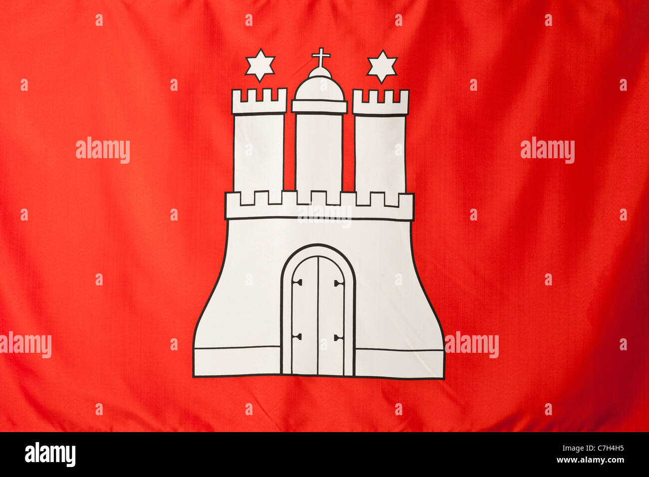 Hamburg flag, coat of arms of Hamburg on a red flag Stock Photo - Alamy
