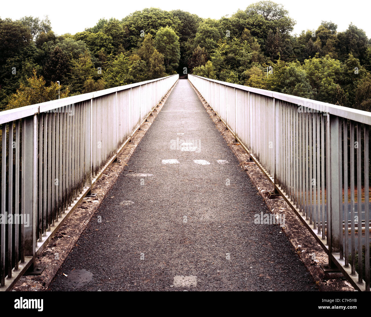 A metal footbridge crossing a road in Redditch, Worcestershire, England ...