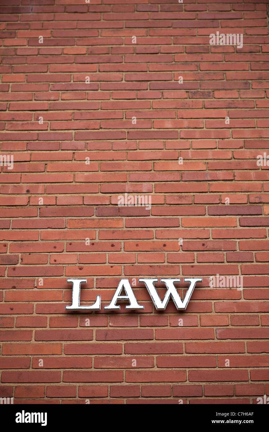 A sign on a wall at the college of law at University of Birmingham ...