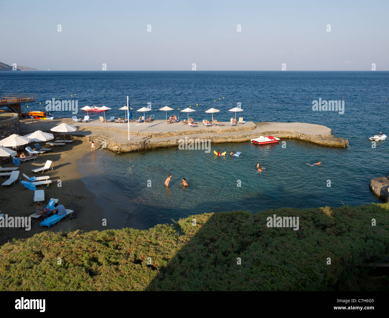 The man made beach and jetty at the luxury resort of the St Nikolaos ...