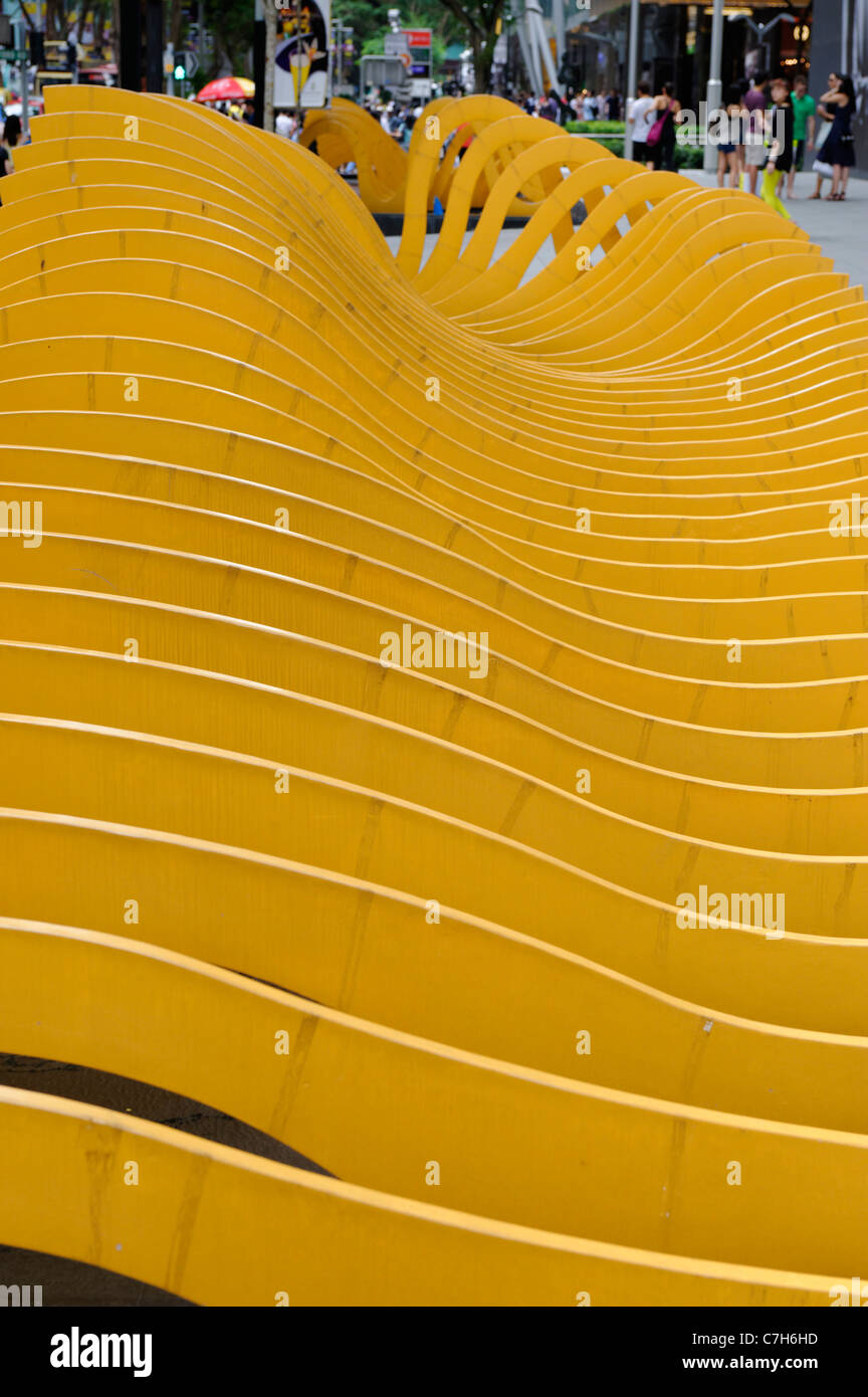Yellow wave design art on Orchard Road, Singapore Stock Photo - Alamy