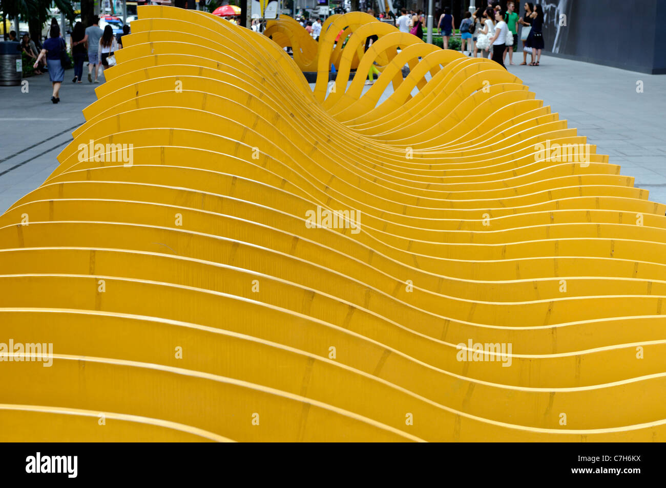 Yellow wave design art on Orchard Road, Singapore Stock Photo - Alamy
