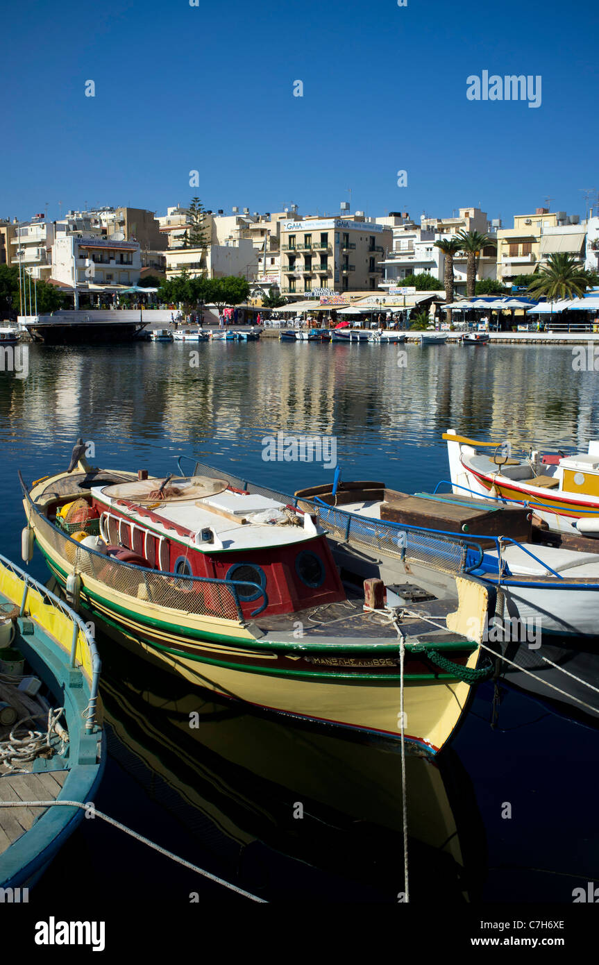 Traditional colourful fishing boats line the Lake Voulimeni in Agios ...