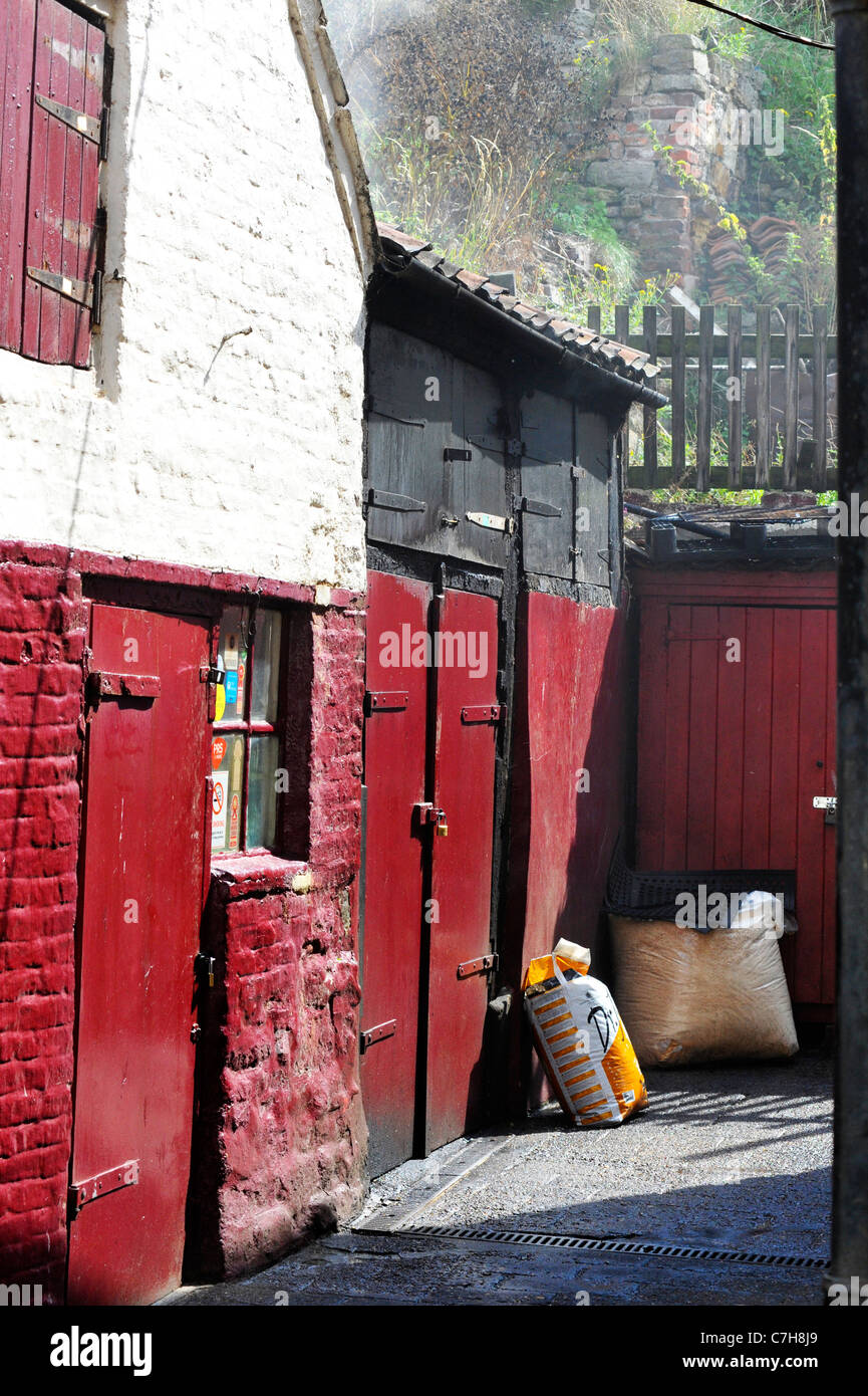 Fortune's Whitby Cured Kippers shop with smoke coming from the smoking ...